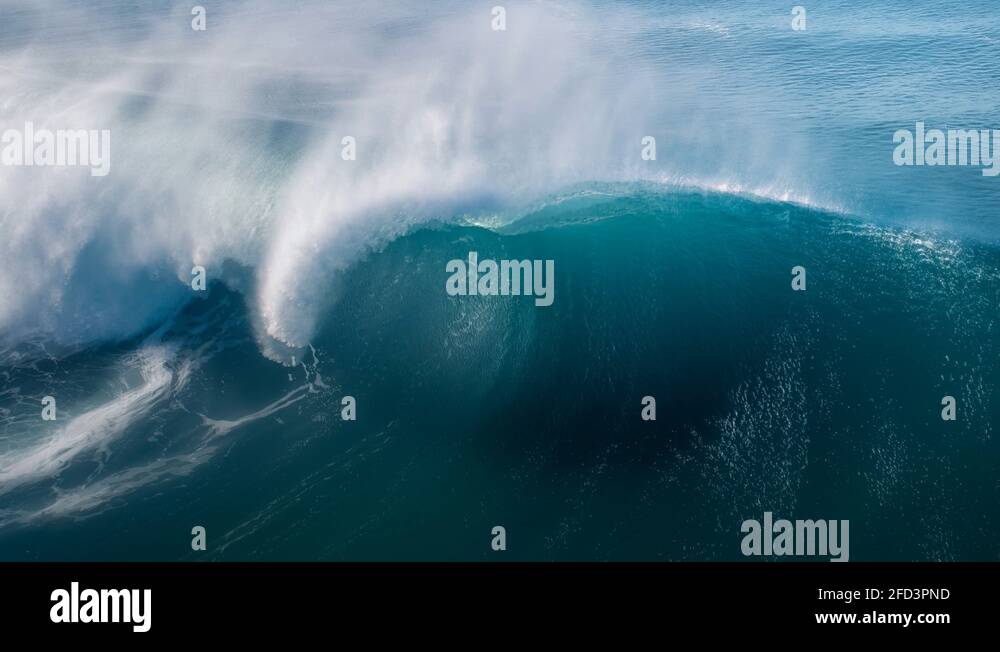Cinemagraph of ocean wave rolling onto beach background Stock Video ...