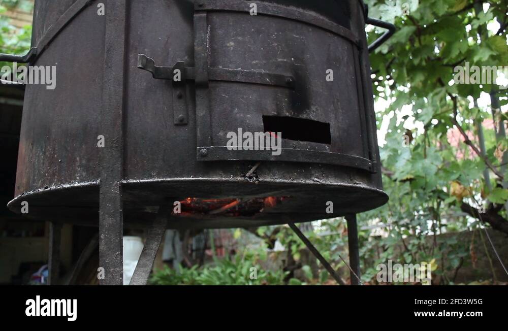 Traditional distillation of rakia (oven Stock Video Footage - Alamy