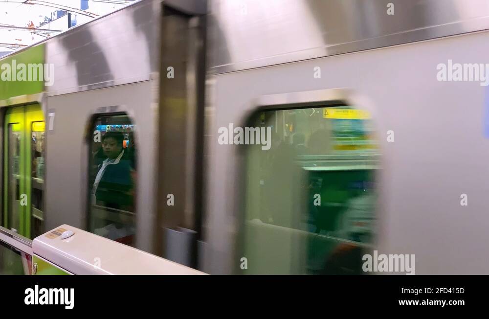 Yamanote line train arriving at Shibuya station in Tokyo Stock Video ...