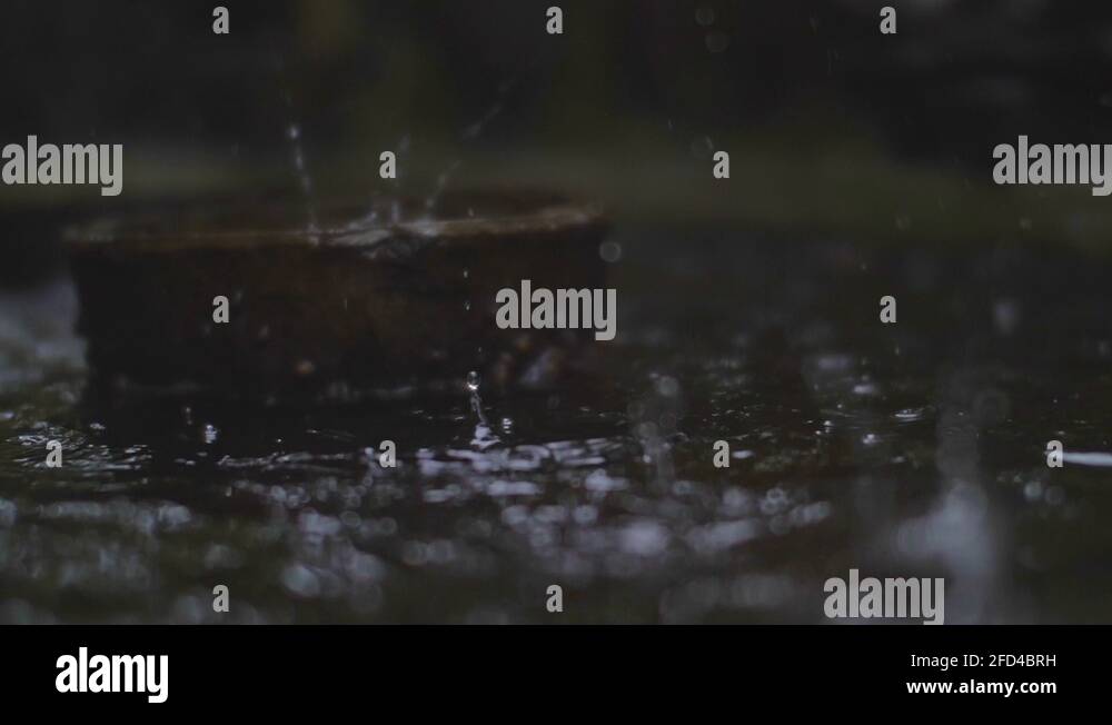 Drops rain splashes in puddle Stock Videos & Footage - HD and 4K Video ...