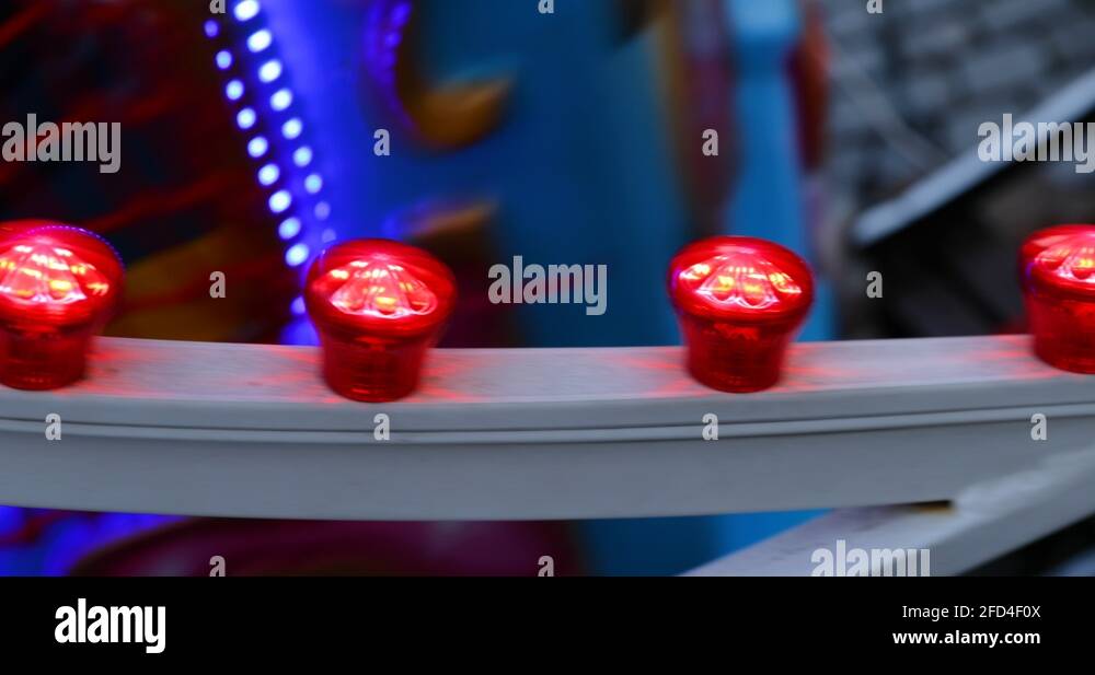 Pilgrimage attraction to red fairy lights on a white railing and in the ...