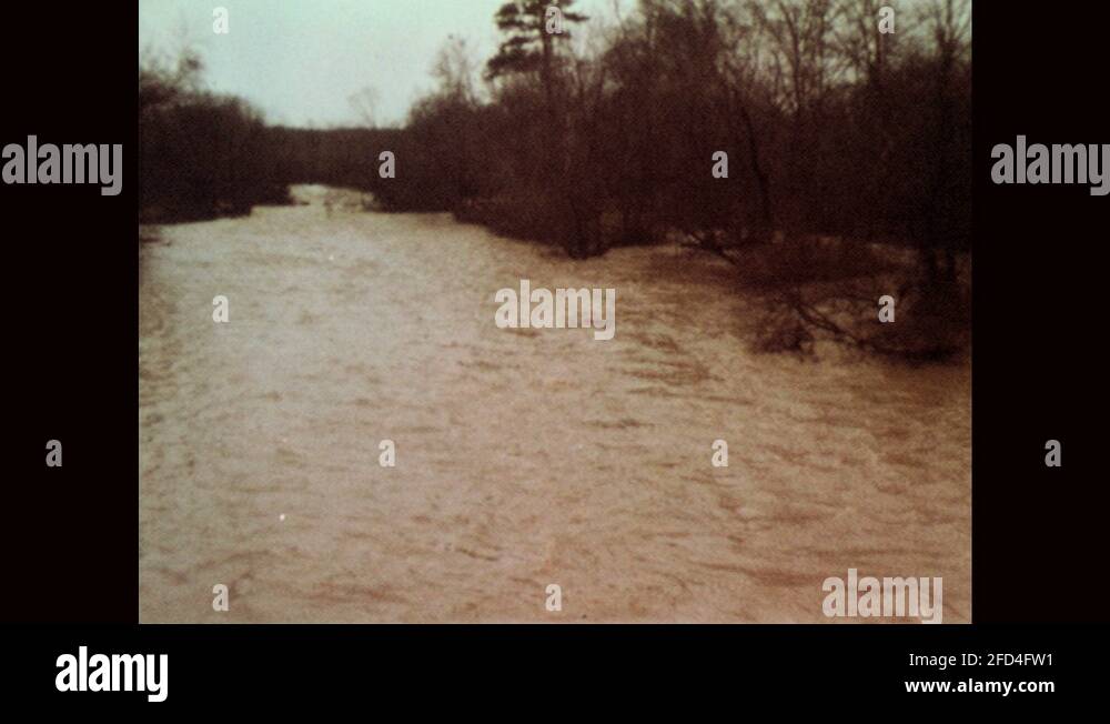 1960s: Water flows down river. River surrounded by forest. Illustration ...