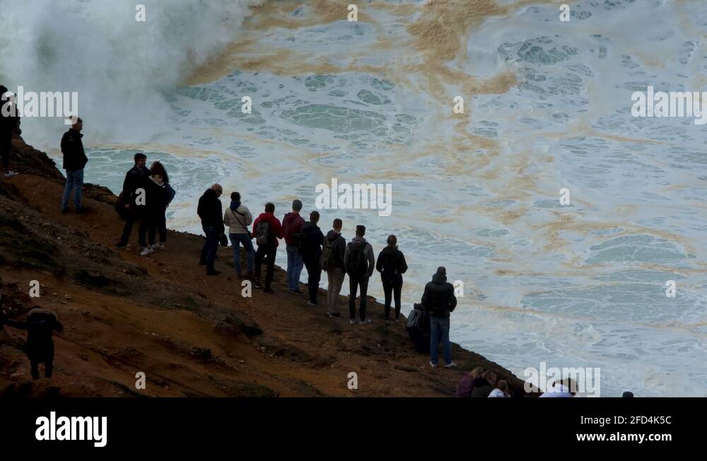 People cliff edge windy Stock Videos & Footage - HD and 4K Video Clips ...