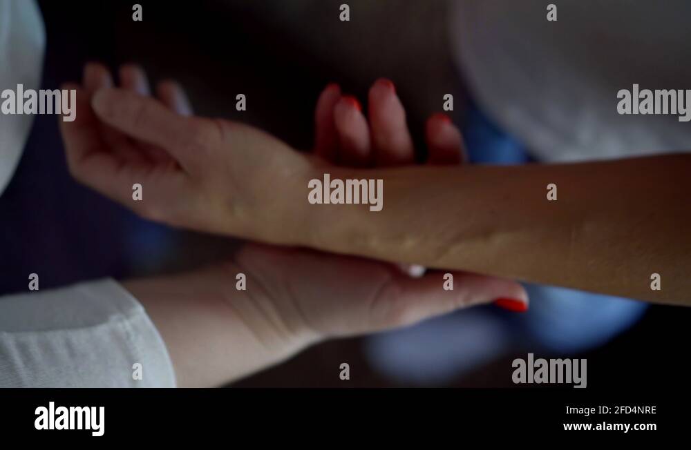 Touching wrist Stock Videos & Footage - HD and 4K Video Clips - Alamy