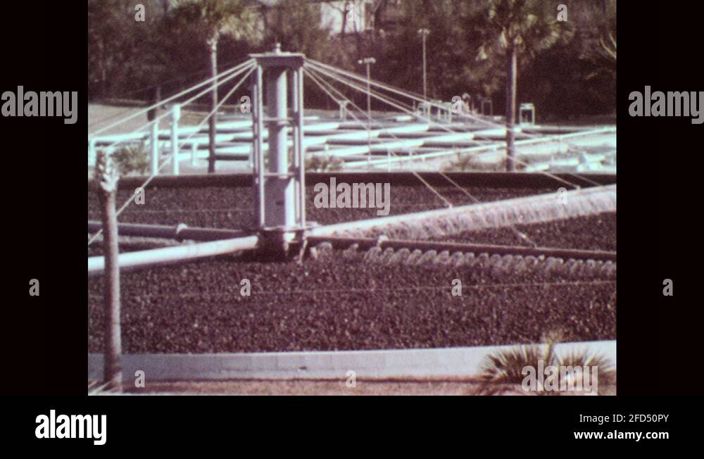 1960s: Water treatment plant. Water flows into processor, suds form ...