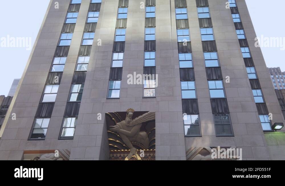 Rockefeller Plaza in NYC with famous Biblical saying above the building ...