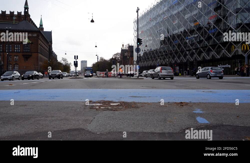 Peaceful traffic with cyclists at major intersection in capital city ...