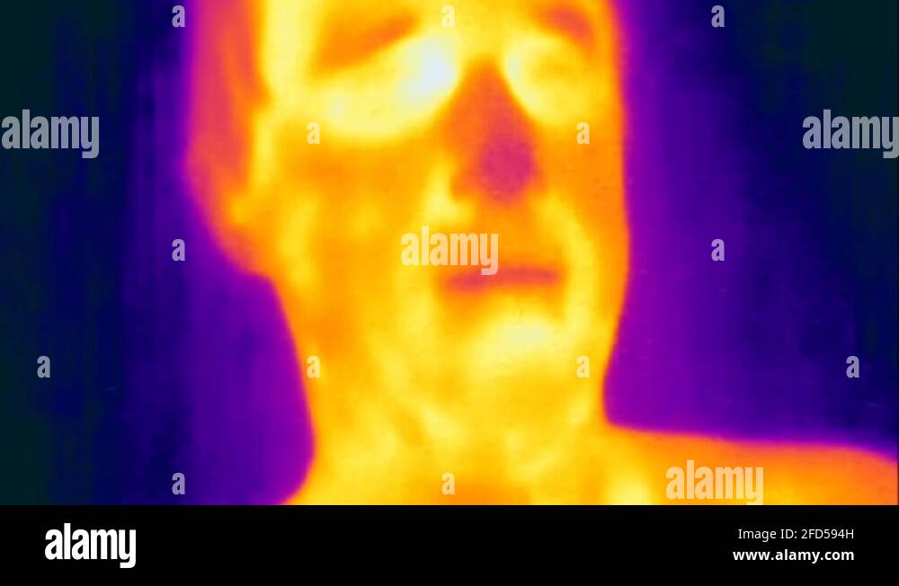Thermal Imaging Of Man Drinking Cold Drink And Spilling Some On Face ...