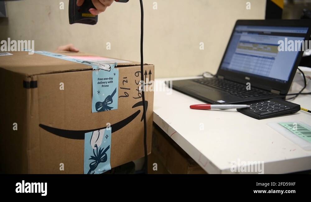 Military postal working scanning barcode on parcel Stock Video Footage ...