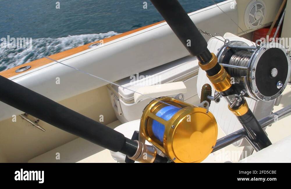 Huge Deep Sea Fishing Rods on Moving Boat Stock Video Footage - Alamy