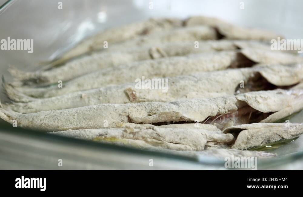 Oil covered fish Stock Videos & Footage - HD and 4K Video Clips - Alamy