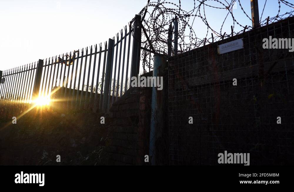 Wire security fence and gate Stock Videos & Footage - HD and 4K Video ...