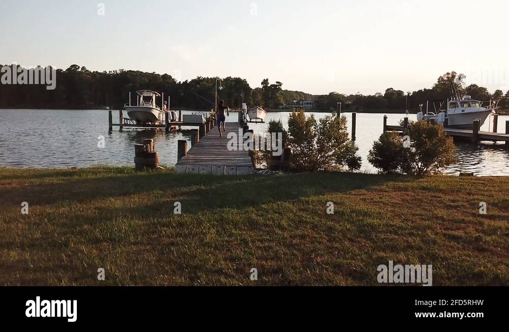 Man jumping dock Stock Videos & Footage - HD and 4K Video Clips - Alamy