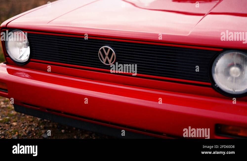 Volkswagen logo on black grille of red modified VW Golf MK1, medium ...