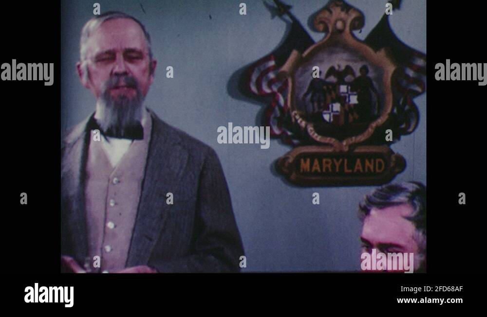 1950s: men sitting behind table talking to group of people Stock Video ...