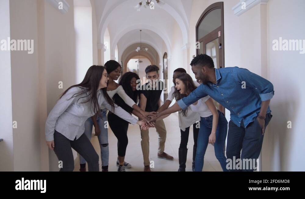 Unity joining hands Stock Videos & Footage - HD and 4K Video Clips - Alamy