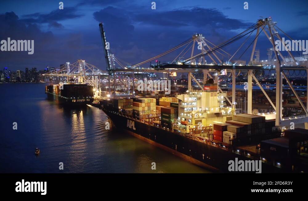 Port Miami on the background of night sky and deep blue water. Port ...