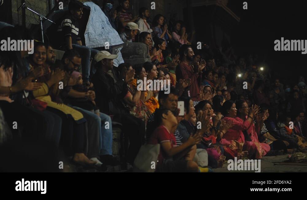 People sing, clap, smile, passion audience, rite at Pashupatinath Aarti ...
