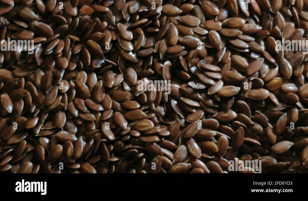 Brown raw flax seeds linseed as natural food background or grain ...