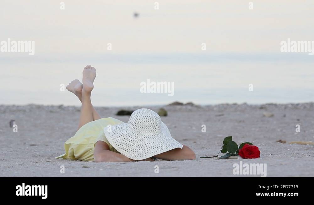 Lady laying on a beach Stock Videos & Footage - HD and 4K Video Clips ...