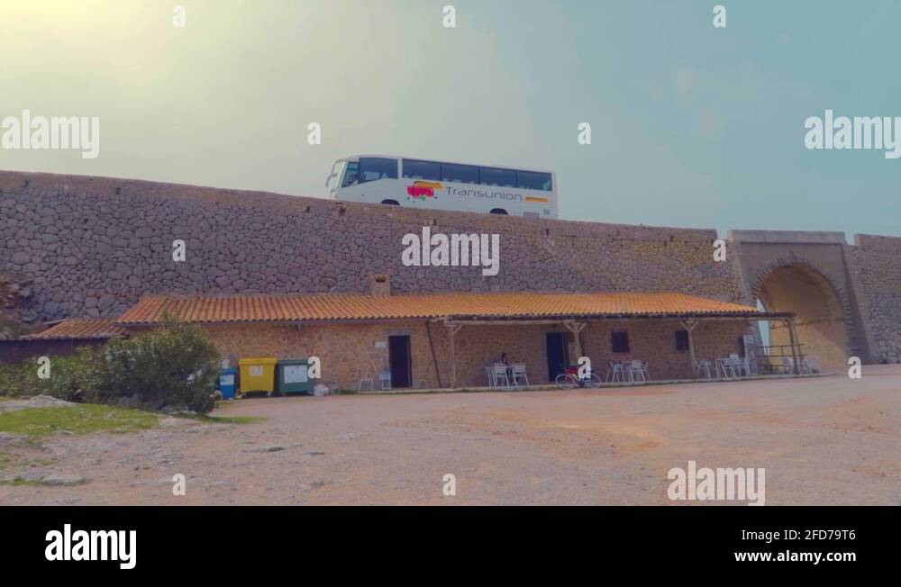 A passenger white busing over the rock bridge. A low angle view Stock ...