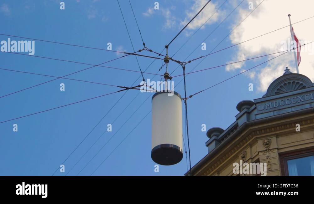 Electricity line with floating pole, Copenhagen Denmark flag and ...
