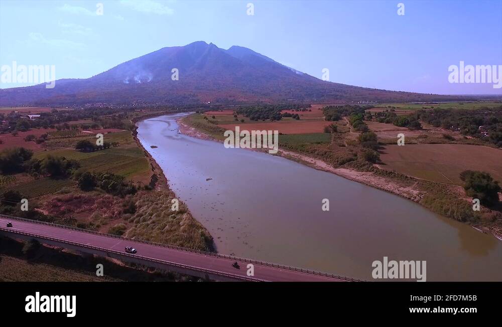 A drone shot of Mt. Arayat in Pampanga, Philippines, and the Arayat ...