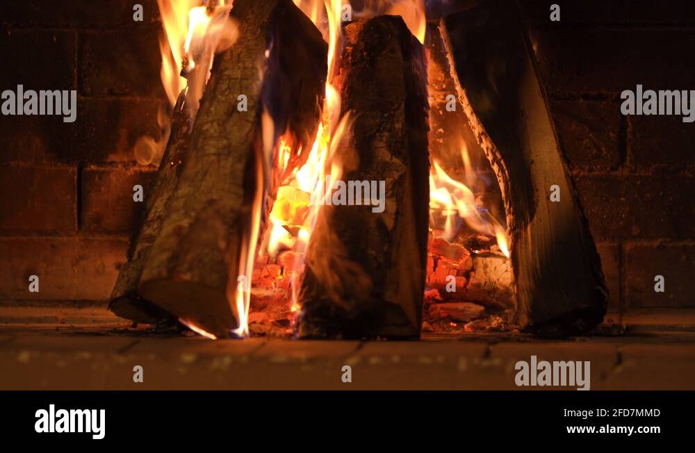 Background concept of fireplace chimney with a beautiful dancing fire ...