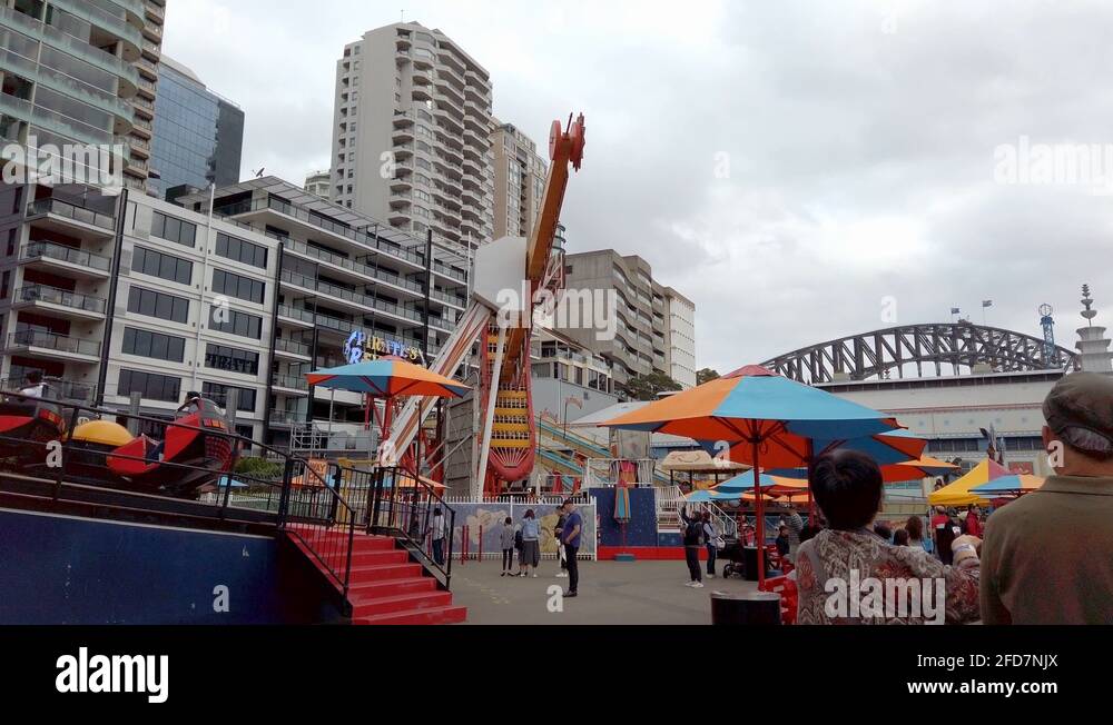 Luna Amusement Park with Ranger loop boat ride and people sitting on ...