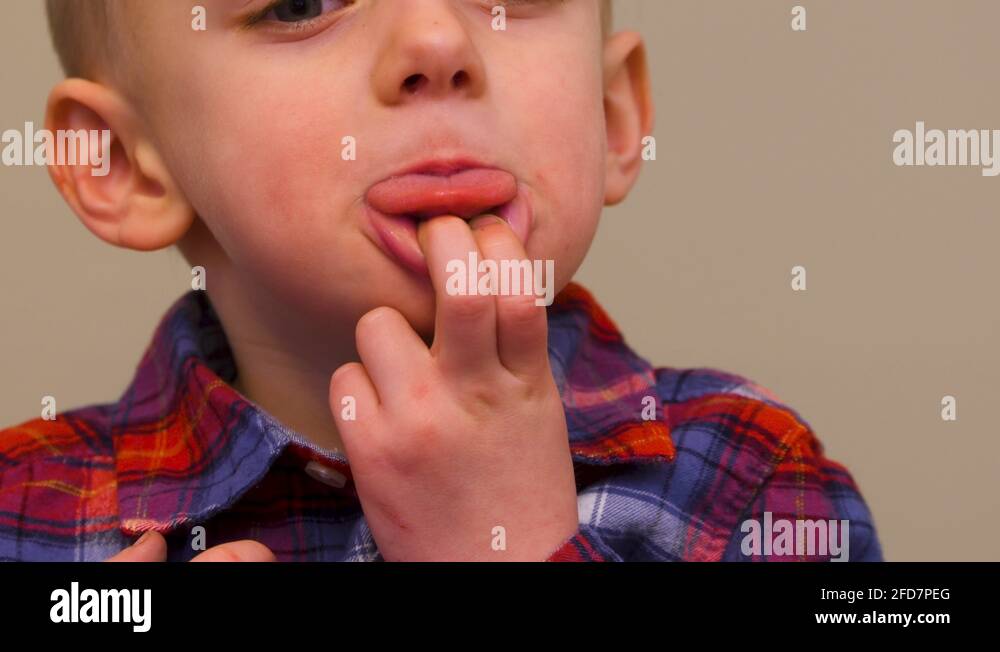 Baby teeth loose Stock Videos & Footage - HD and 4K Video Clips - Alamy