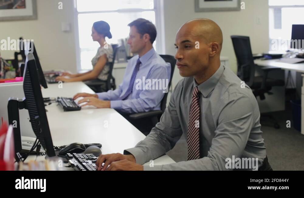 Row of computers office people Stock Videos & Footage - HD and 4K Video ...