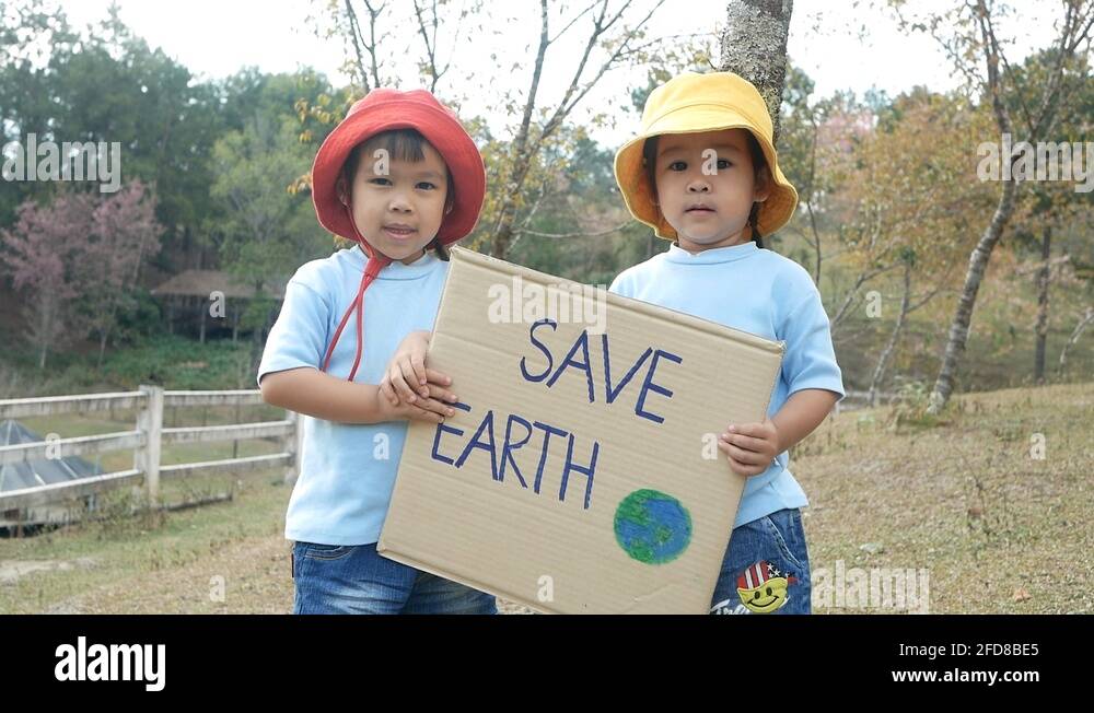 Child girl hold "Save planet" Poster show sign protest against plastic ...