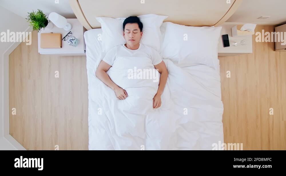 man sleeping well in bed Stock Video Footage - Alamy