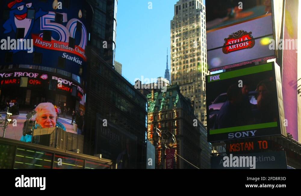 Daytime time lapse view of Times Square in New York City. Flashing ads ...