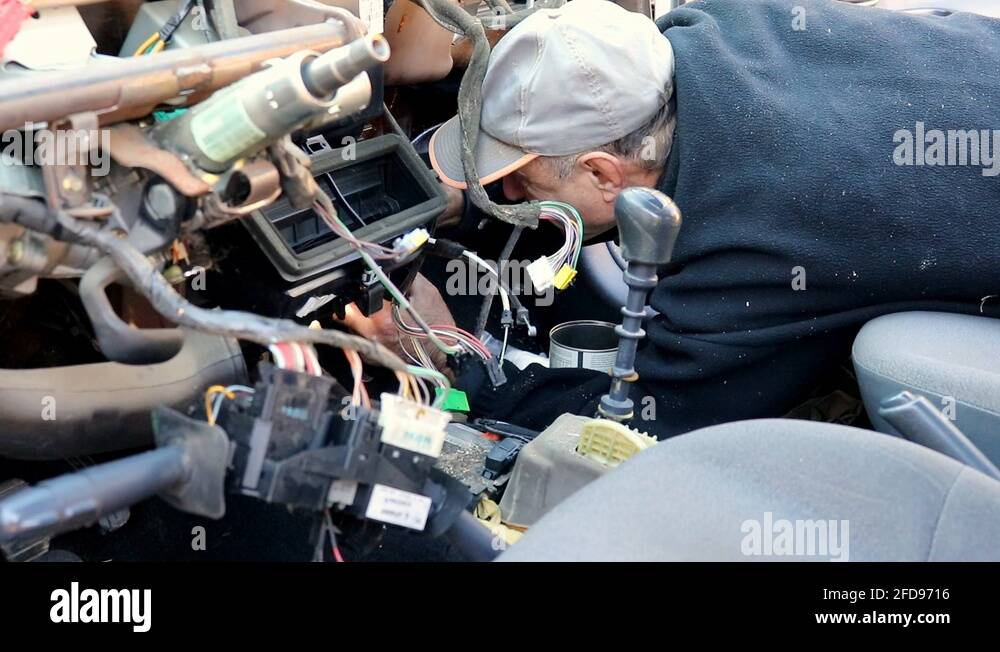 The mechanic man repairing a breakdown of car Stock Video Footage - Alamy