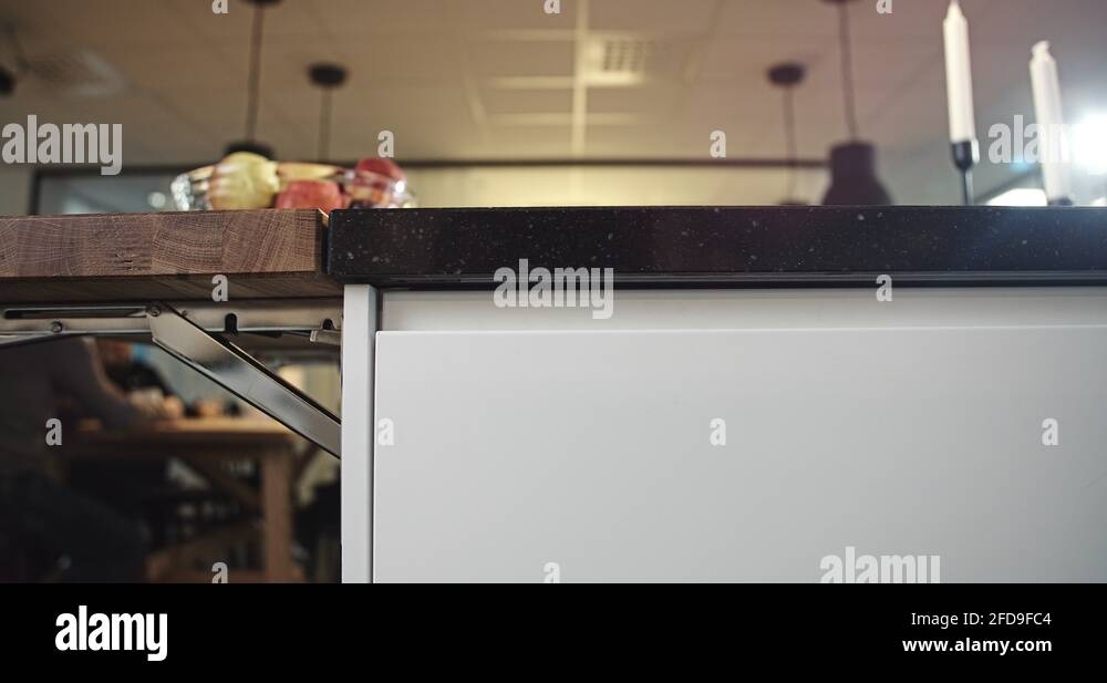 DOLLY SHIT OF WOMAN FOLDING DOWN A MOUNTED OAK TABLE Stock Video ...