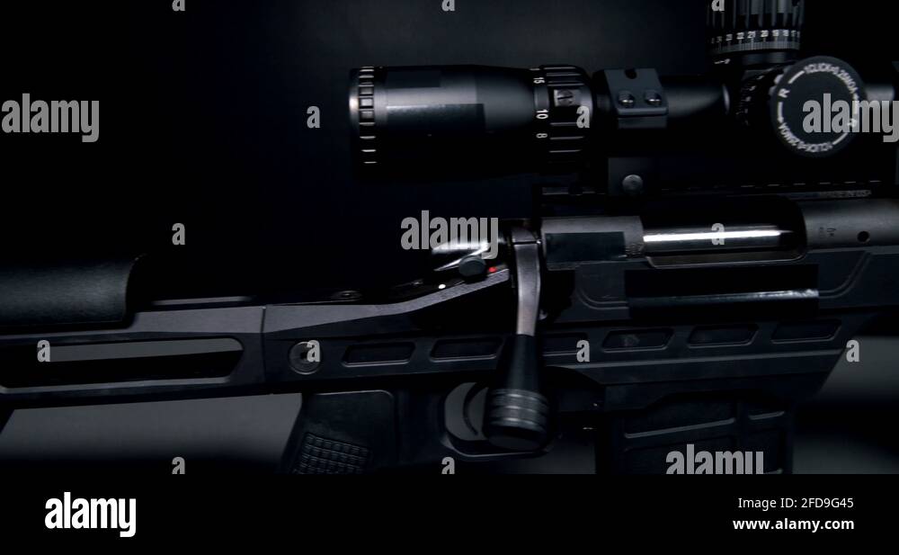 4k close up of black sniper bolt-action rifle, with long range scope ...