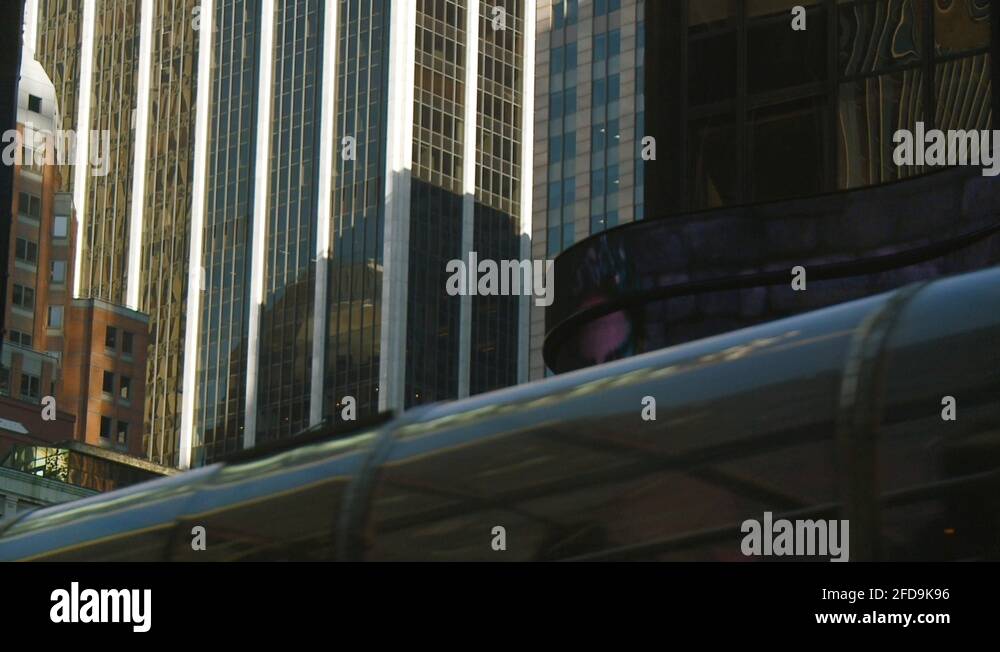 Tall buildings of New York City surround Times Square with its famous ...