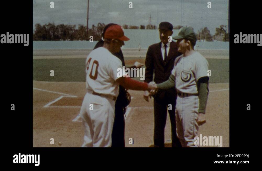 1970s: Baseball coaches, umpires shake hands. Coaches and umpires shake ...