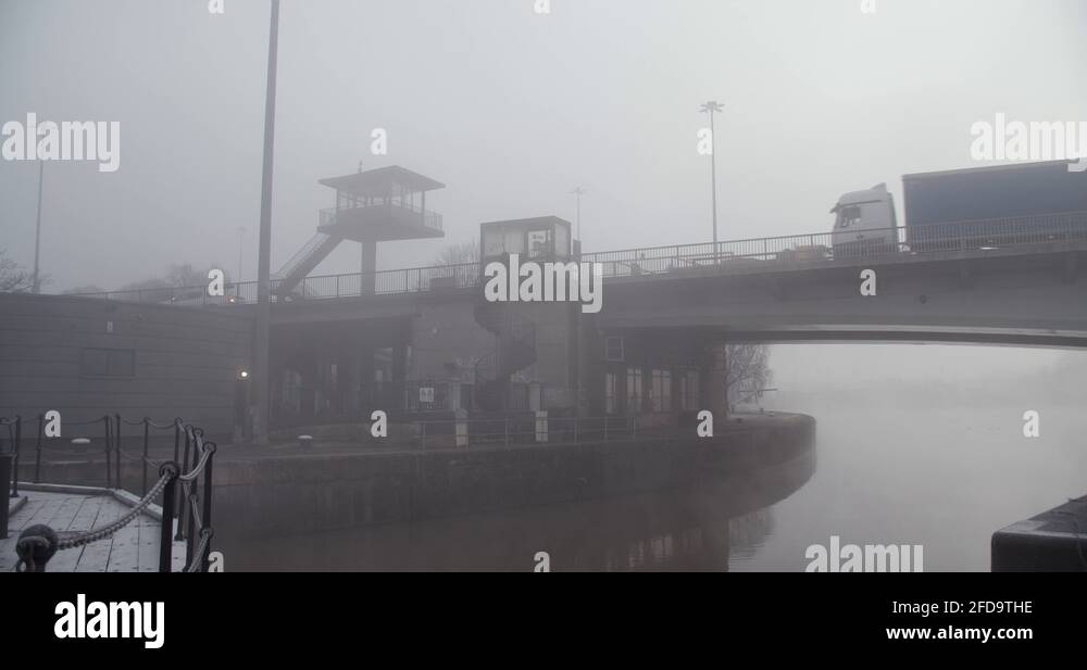 Vehicles passing control room on Bristol (UK) Plimsoll swing bridge on ...