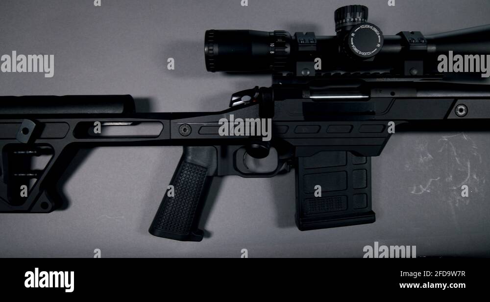 black Sniper Rifle with high powered Scope and ten round Magazine on ...