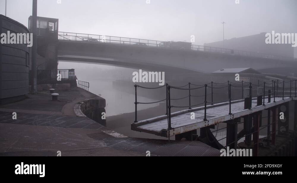 Vehicles passing control room on Bristol (UK) Plimsoll swing bridge on ...