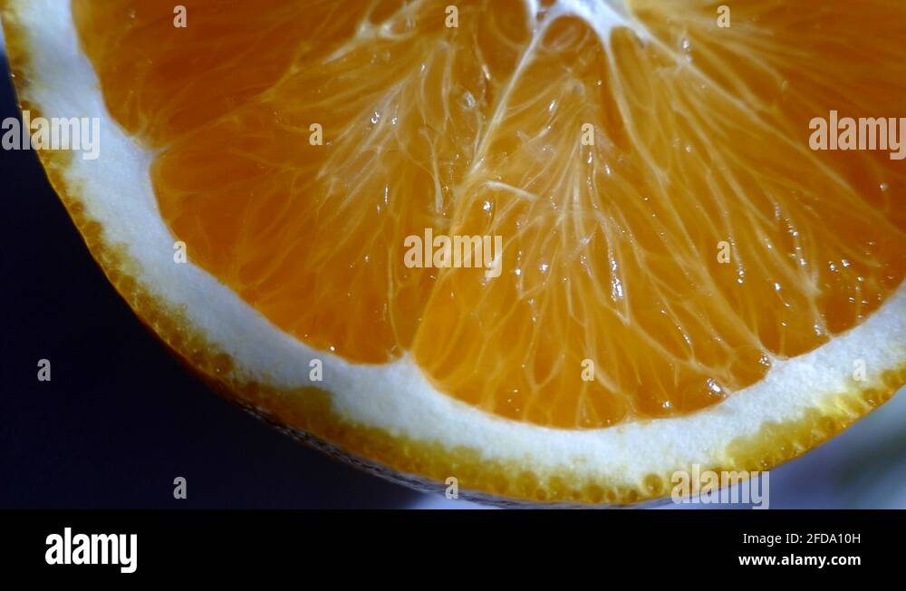Orange cutaway closeup. Citrus fruit. Fresh juice. Pulp of orange Stock ...