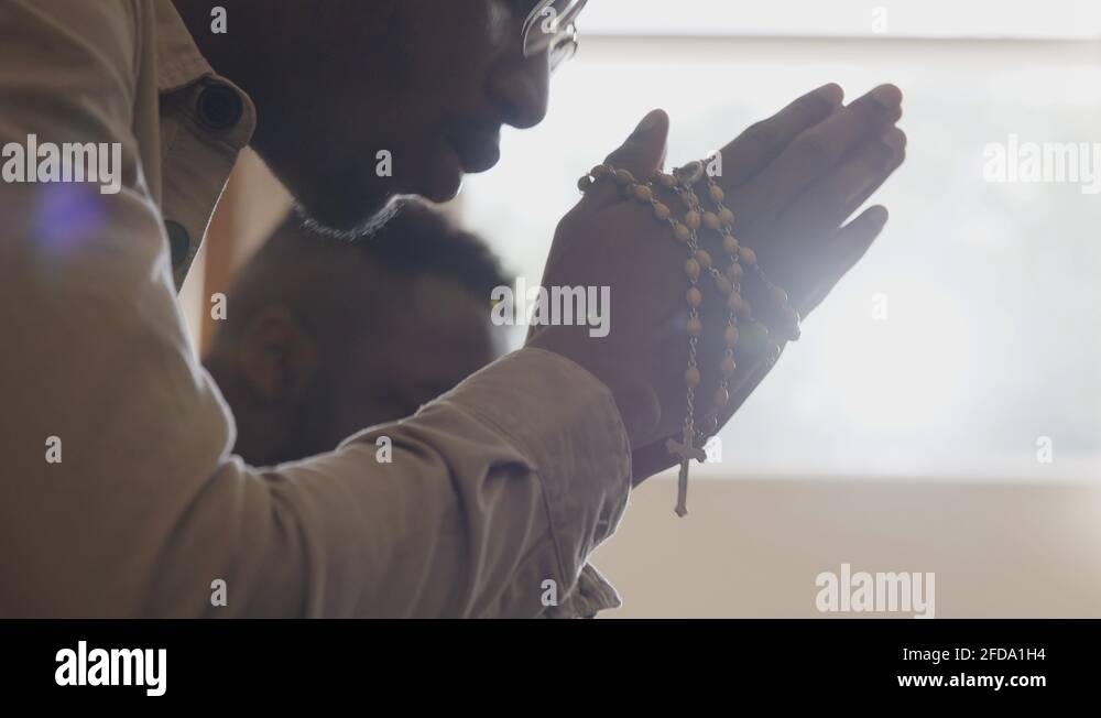 Man with his rosary Stock Videos & Footage - HD and 4K Video Clips - Alamy