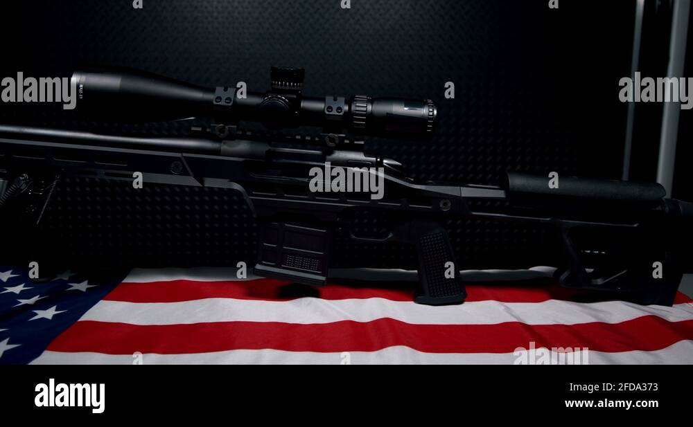 black Sniper Rifle with high powered Scope and ten round Magazine on ...