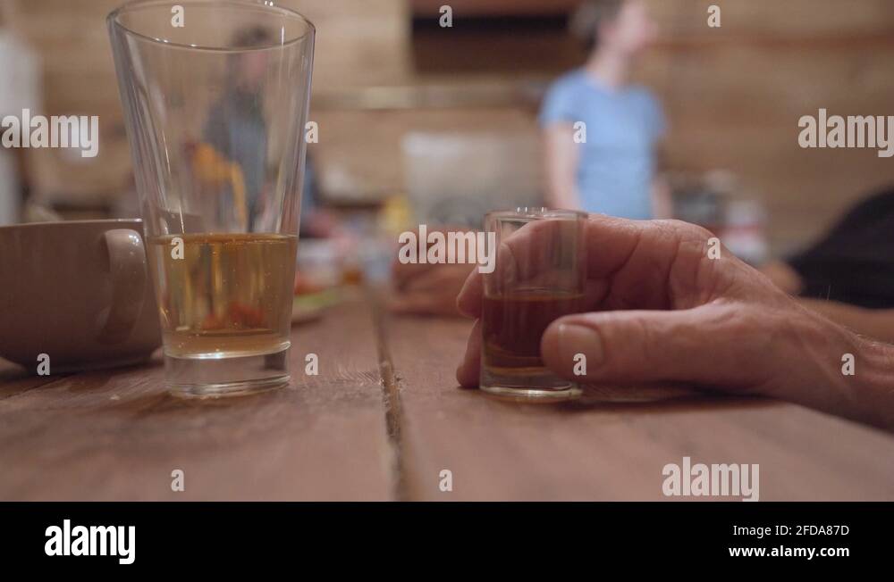 Hand holding shot glass Stock Videos & Footage - HD and 4K Video Clips ...