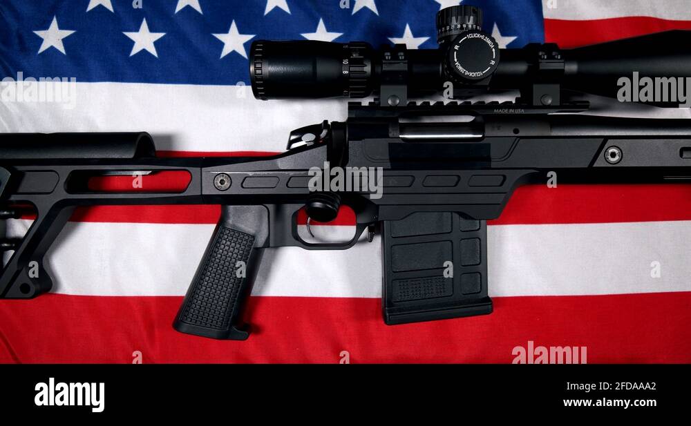 black Sniper Rifle with high powered Scope and ten round Magazine on ...