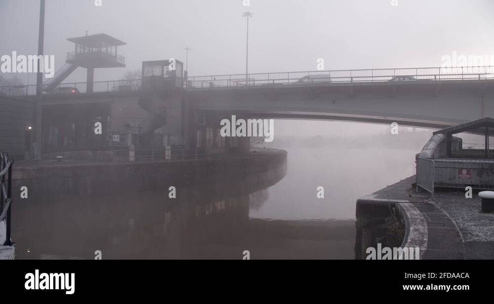Vehicles passing control room on Bristol (UK) Plimsoll swing bridge on ...
