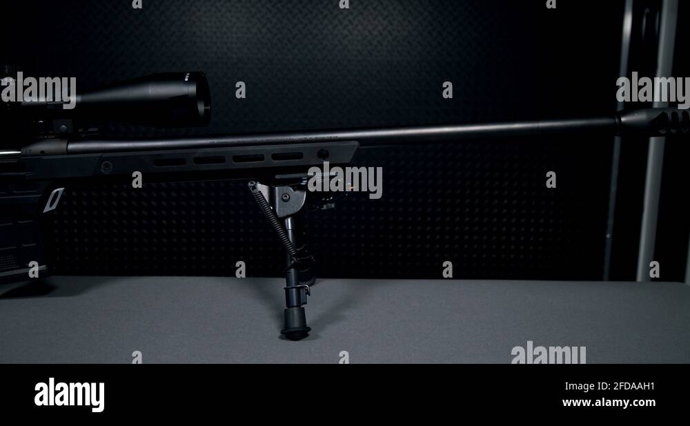 black Sniper Rifle with high powered Scope and ten round Magazine on ...