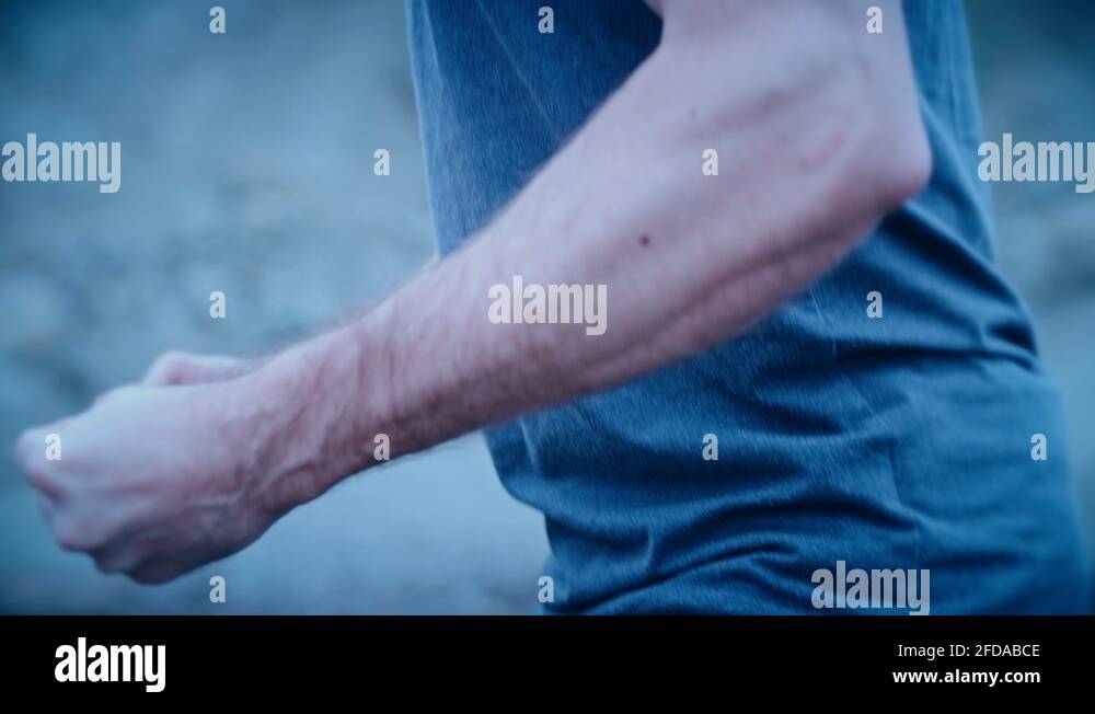 Person flexing biceps muscles powering up close-up 4K Stock Video ...